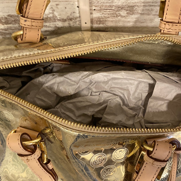 GOLD METALLIC DUFFLE BAG- $398 – Savvy Seconds Boutique